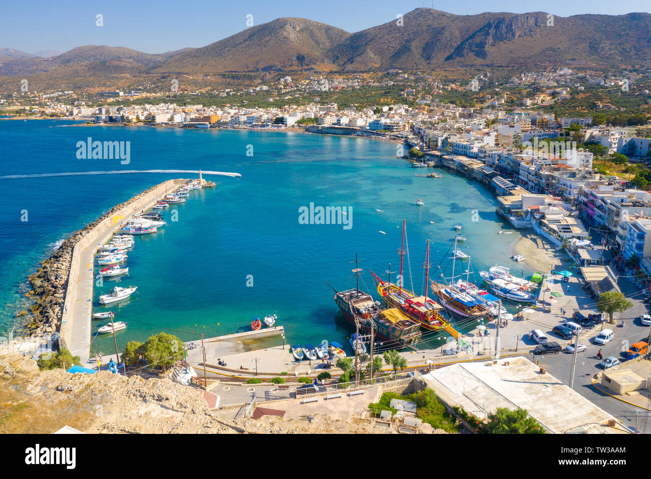 The harbor of the famous resort Chersonissos, Crete, Greece Stock Photo ...