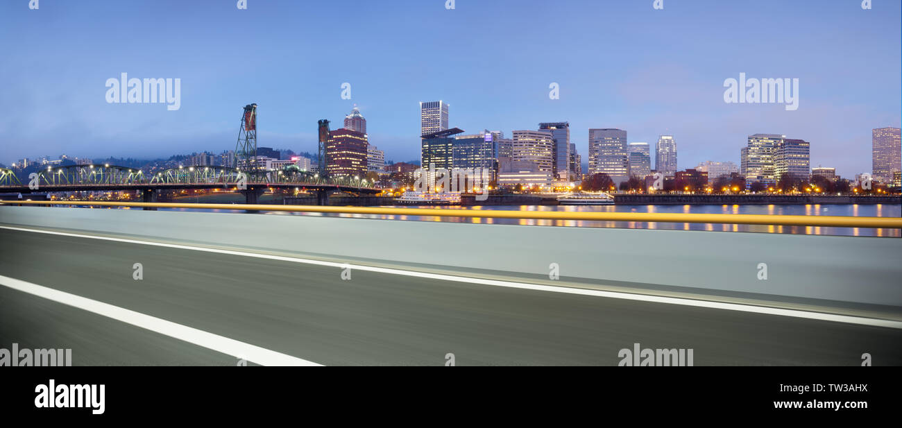 cityscape and skyline of portland from empty asphalt road Stock Photo ...