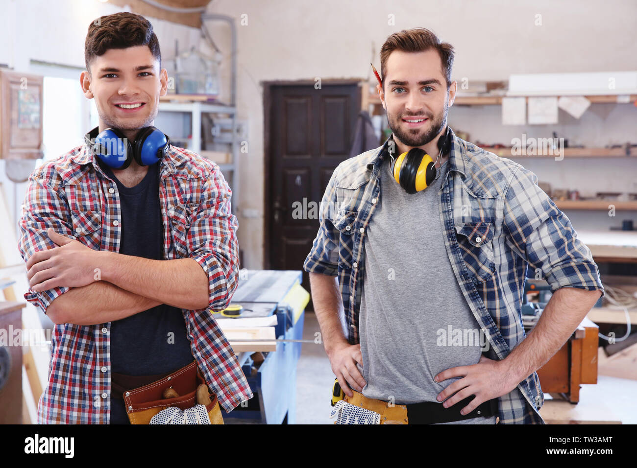 Two handsome young carpenters hi-res stock photography and images - Alamy