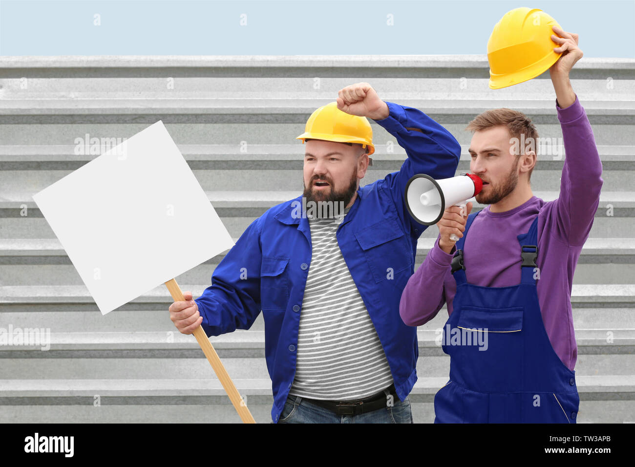 Young men protesting hi-res stock photography and images - Alamy