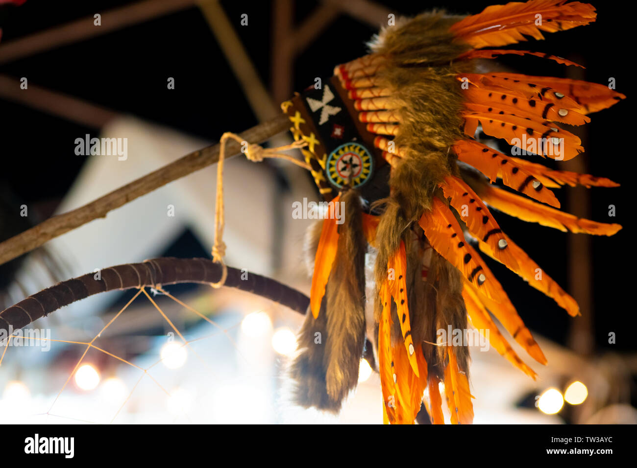 Indian hat. A colorful feathered Indian hat Stock Photo - Alamy