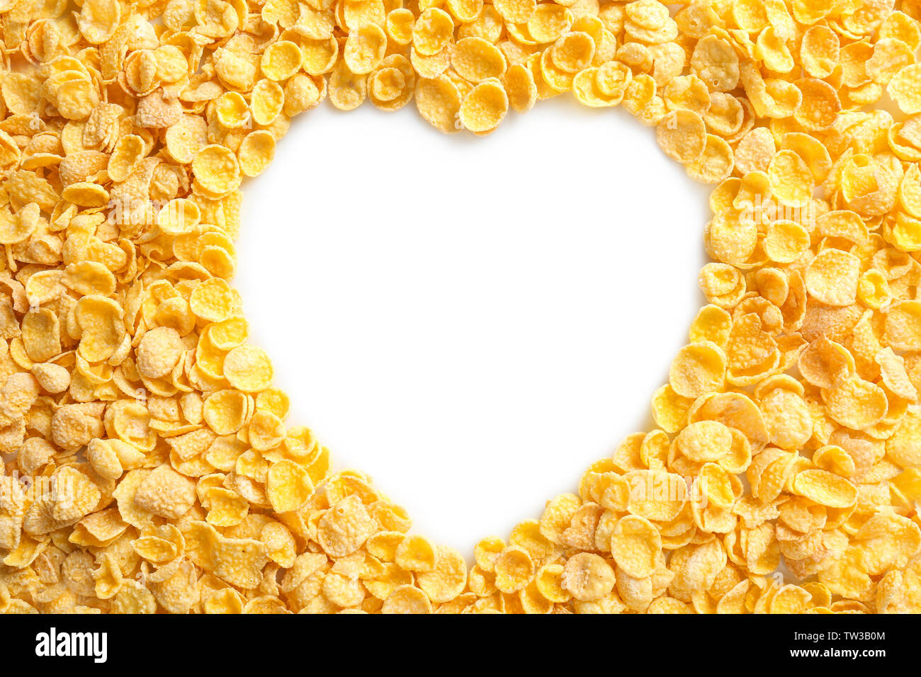 Frame in shape of heart made with cornflakes on white background Stock ...