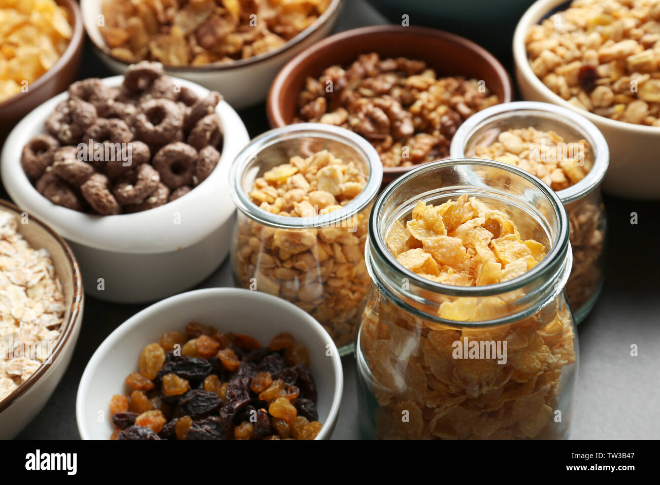 Different healthy breakfast cereals, closeup Stock Photo - Alamy