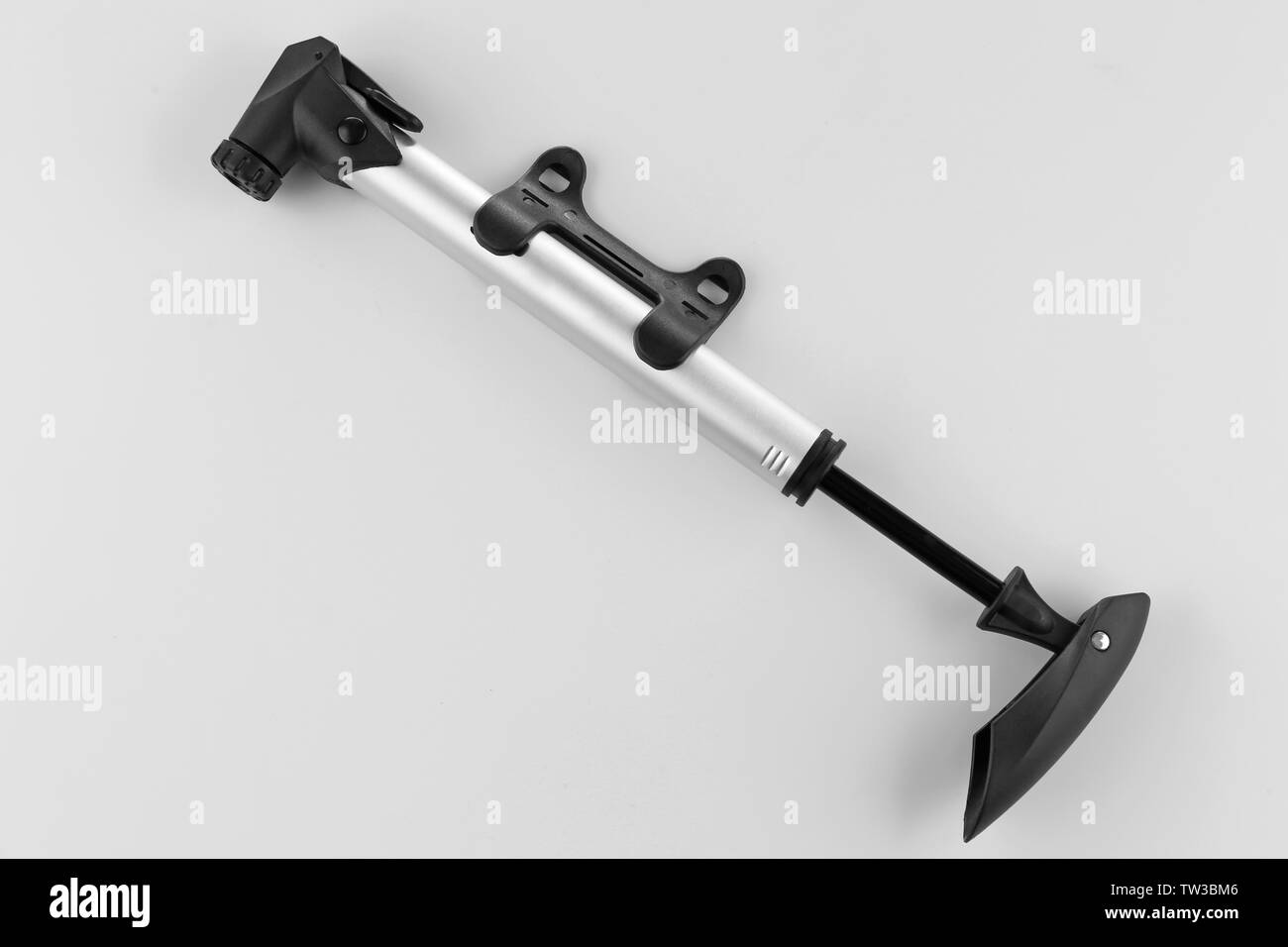 Bicycle pump on white background Stock Photo - Alamy