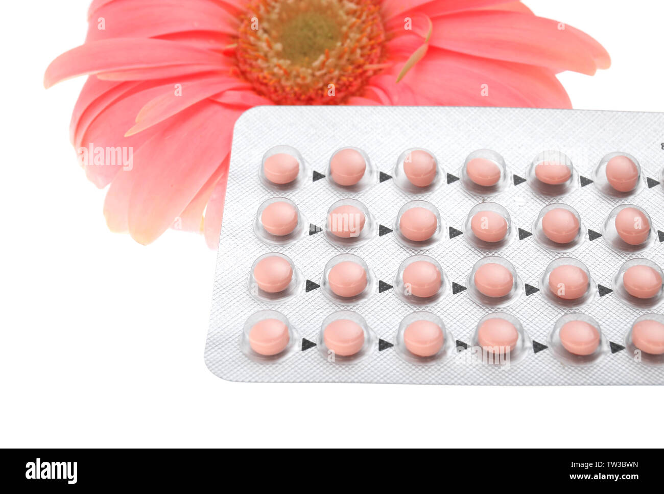 Oral contraception concept. Birth control pills and beautiful flower on ...