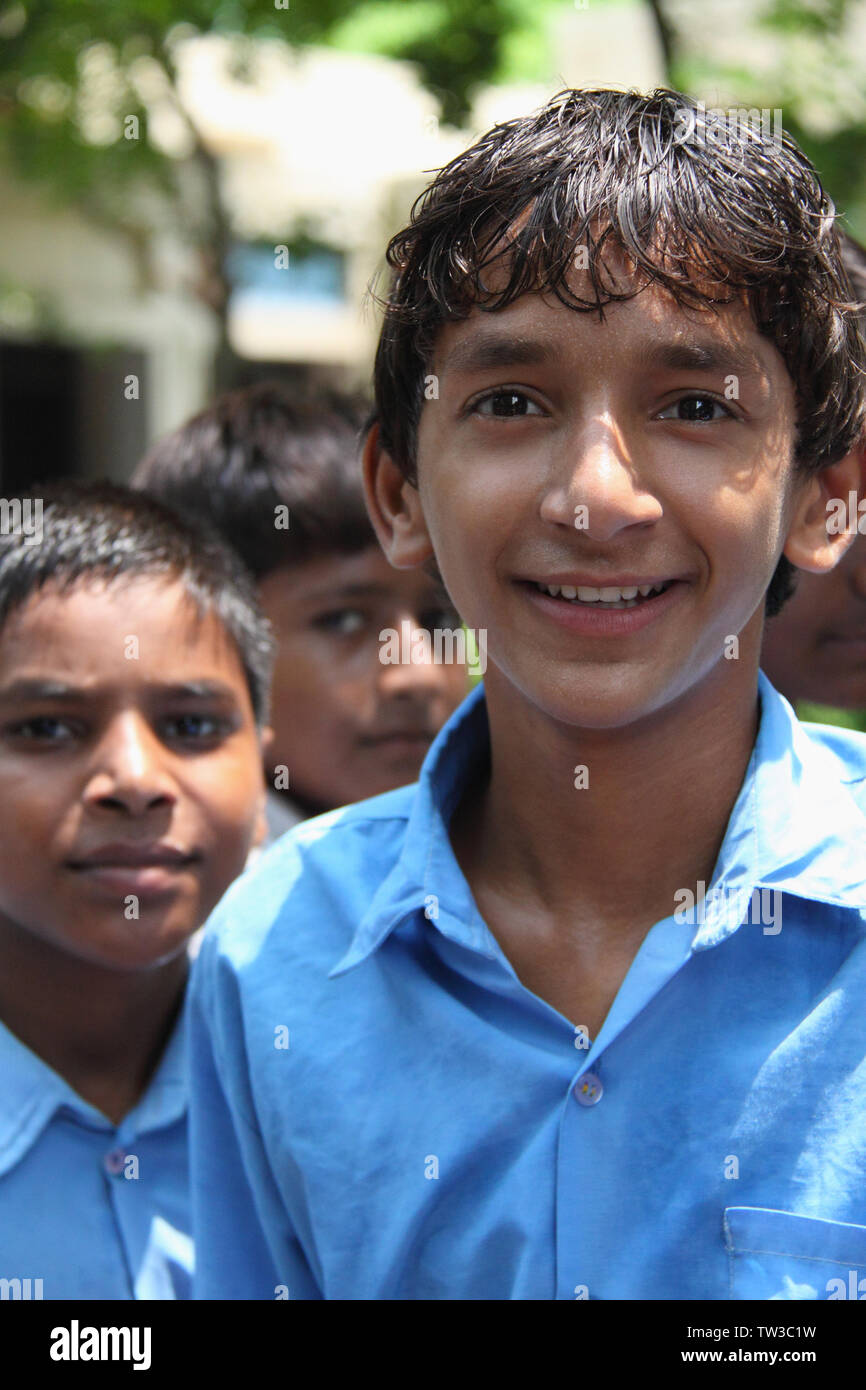Portrait of a schoolboy smiling Stock Photo - Alamy