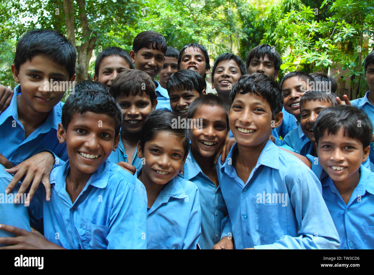 Group of school students smiling Stock Photo - Alamy