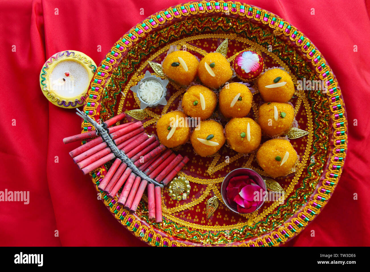 Diwali diya with sweets hi-res stock photography and images - Alamy
