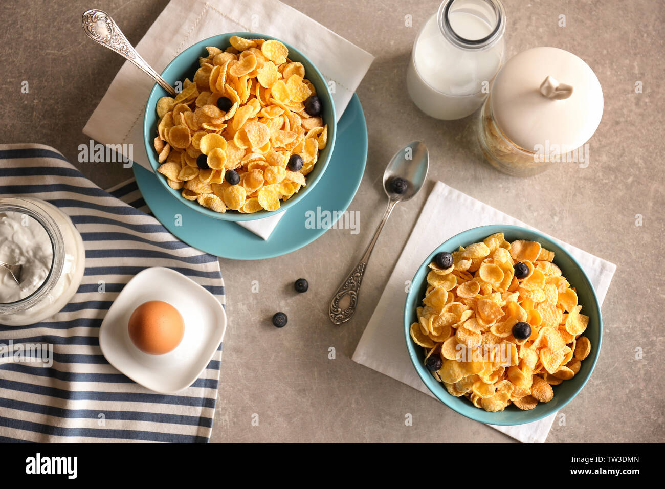 Healthy breakfast with corn flakes on table Stock Photo - Alamy