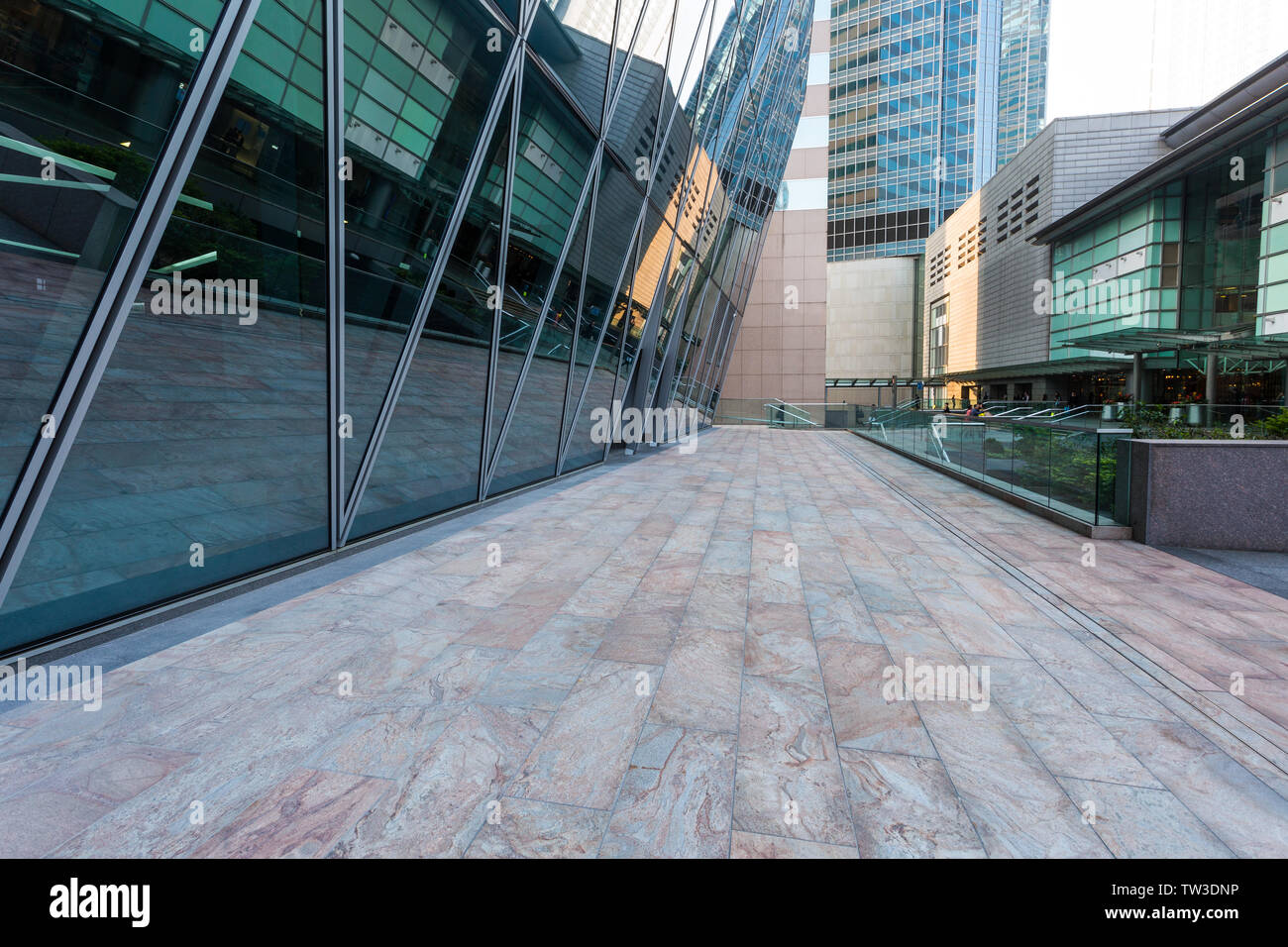 Empty pavement by the side of office building Stock Photo - Alamy