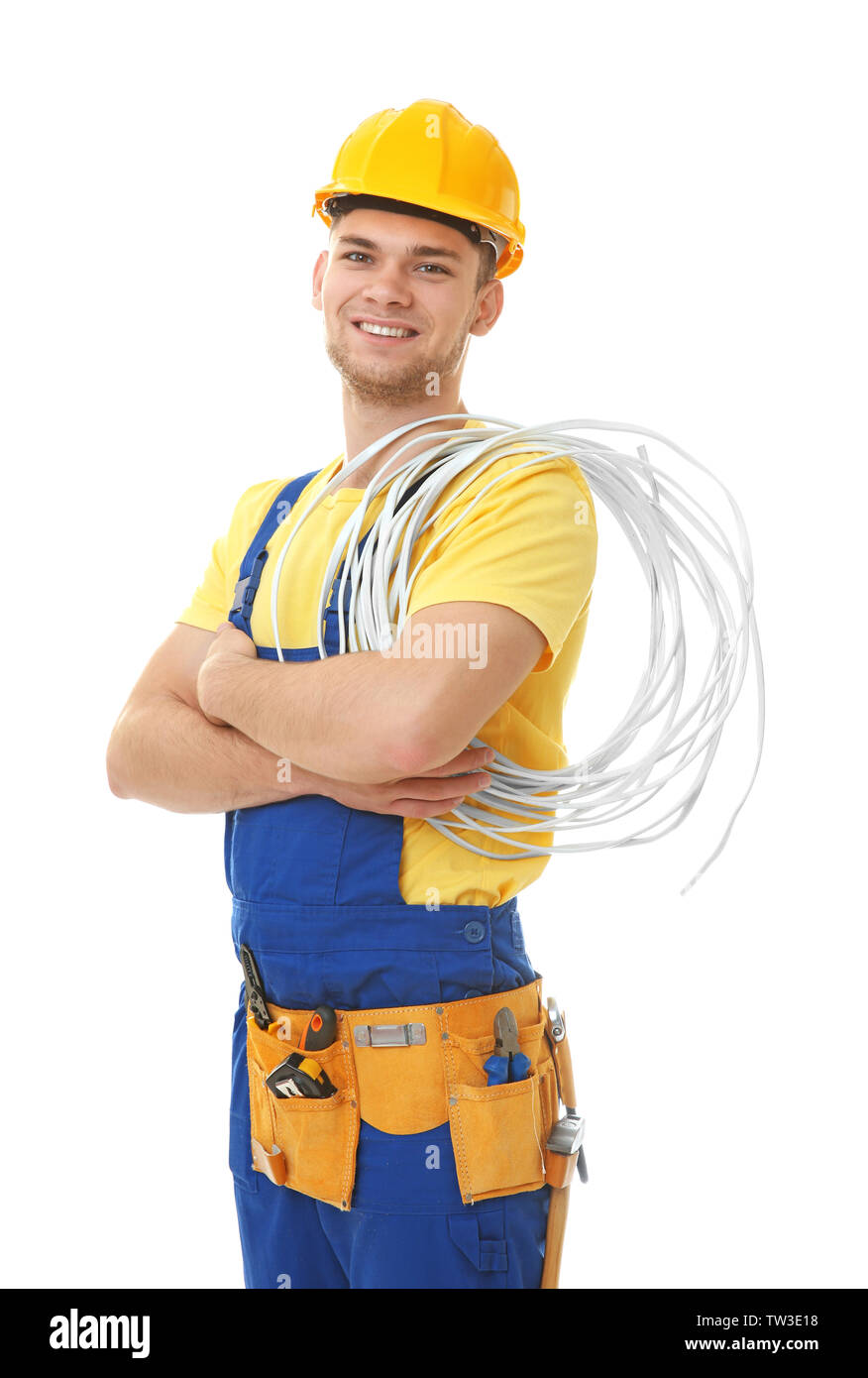 Young smiling electrician with bunch of wires on white background Stock ...