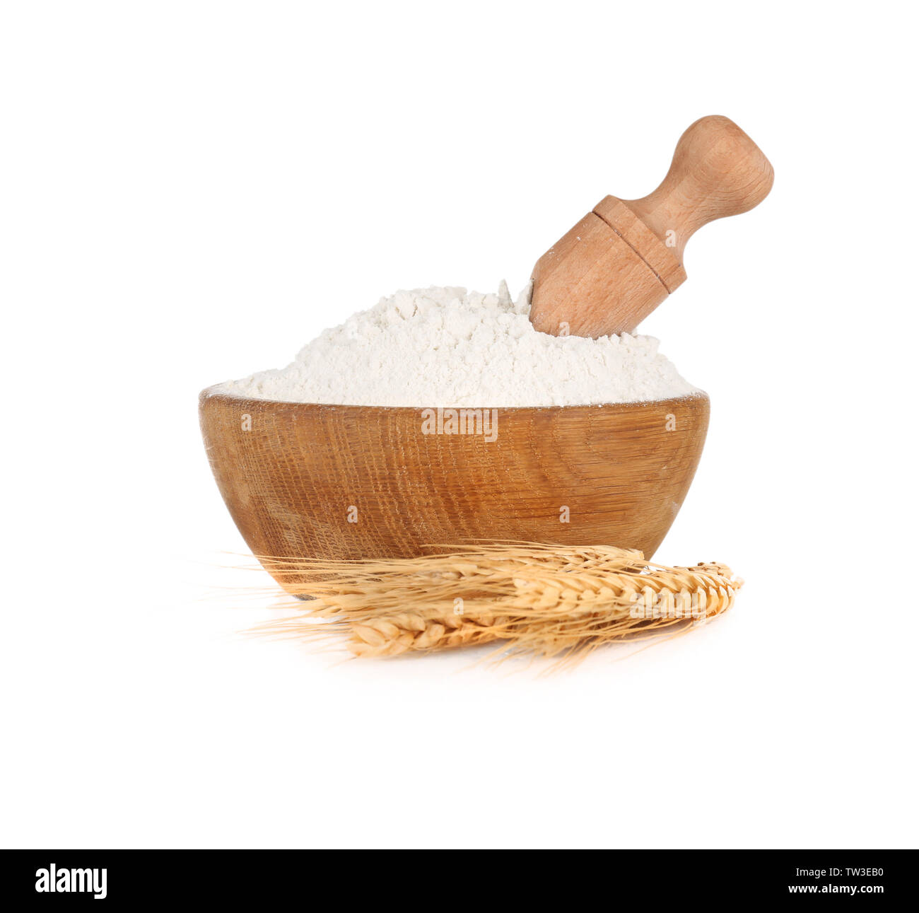 Wooden bowl with flour on white background Stock Photo - Alamy