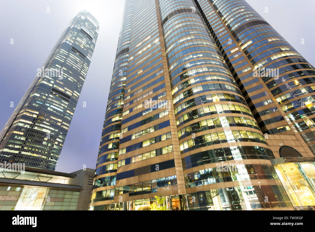 Tall office by night Stock Photo - Alamy
