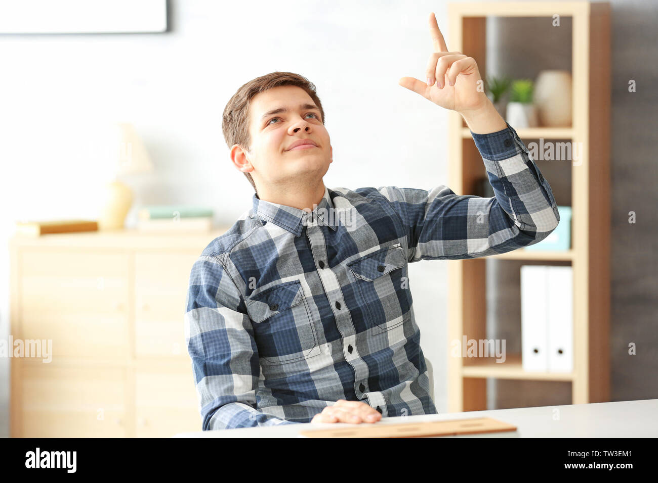 Portrait of handsome man on blurred background Stock Photo - Alamy