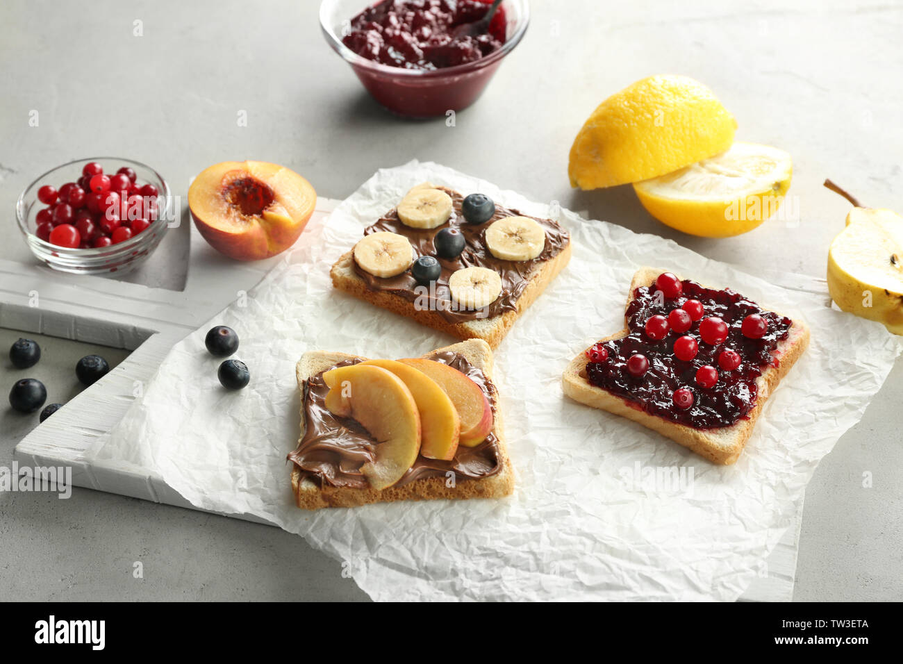 Breakfast different toasts berries hi-res stock photography and images ...