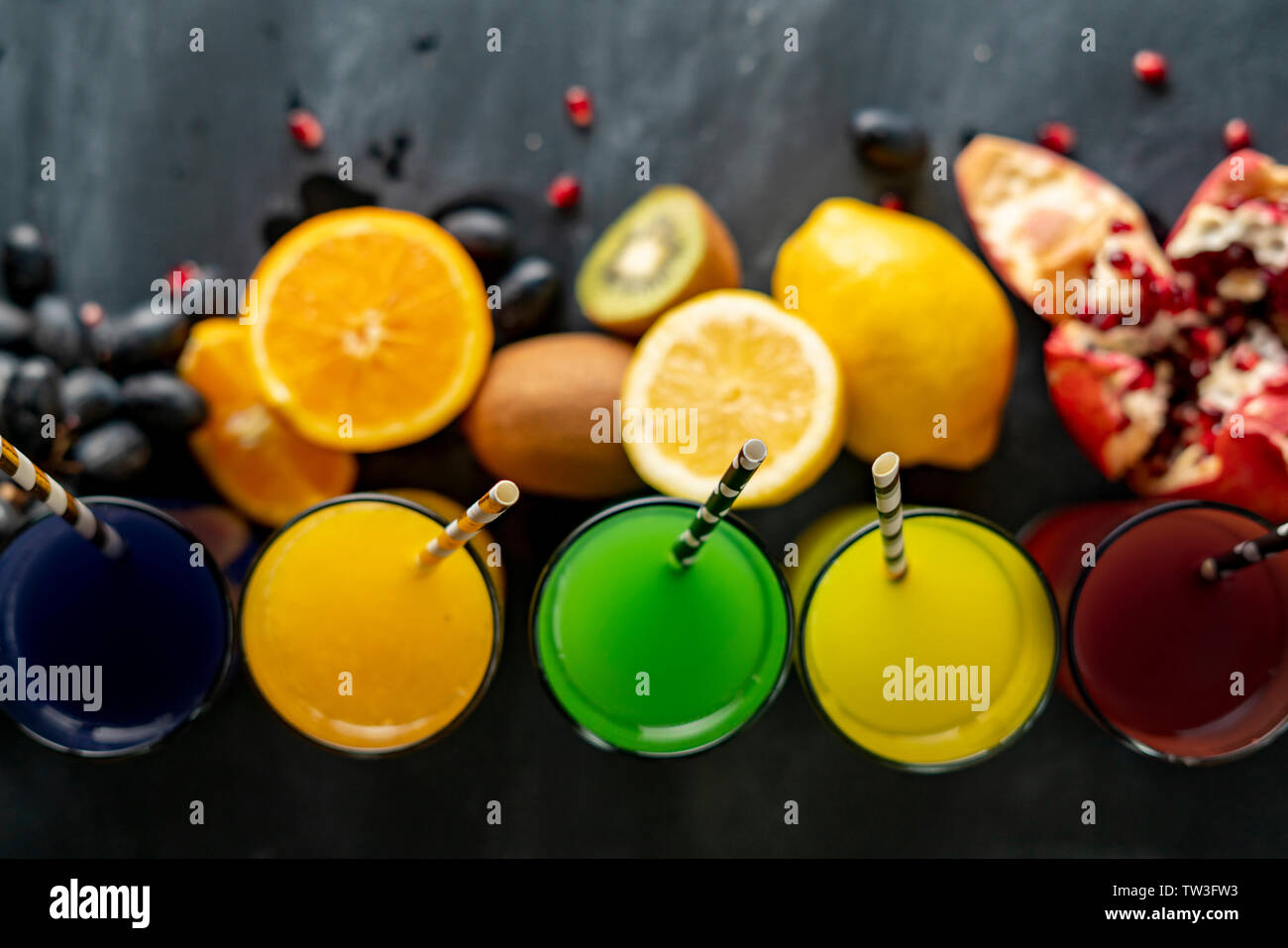 cold fresh smoothie squeezed from different tropic exotic fruits such ...