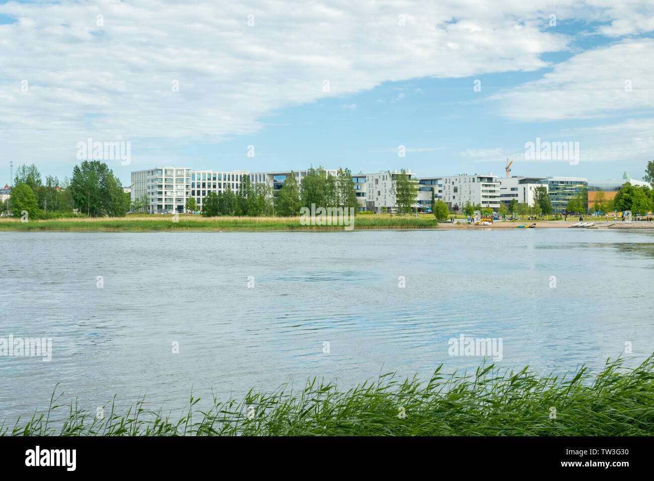 Toolo Bay in City Park, Helsinki, Finland. Across the water are new ...