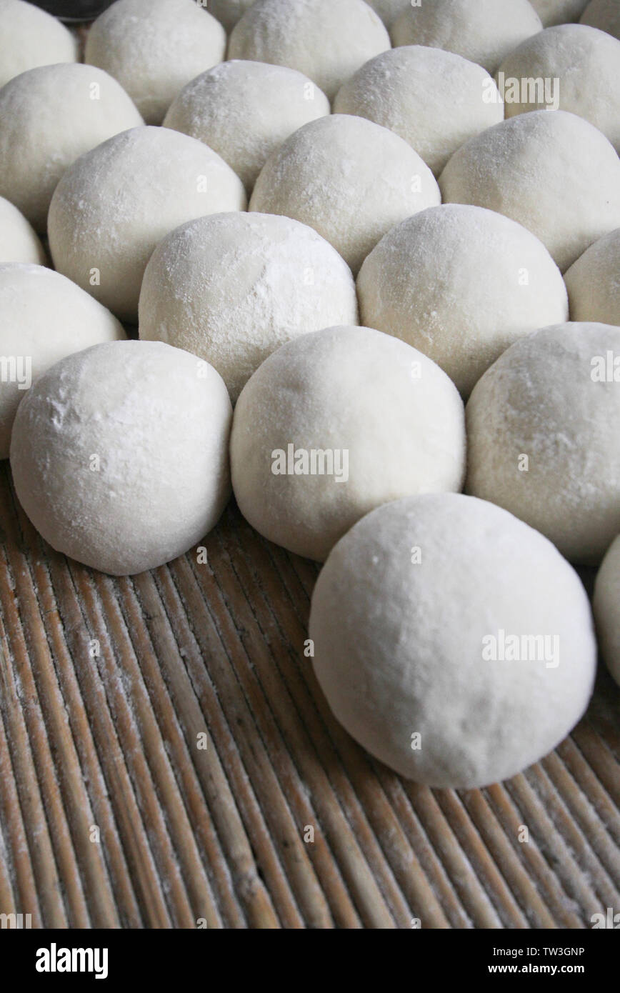 Family handmade steamed buns Stock Photo - Alamy