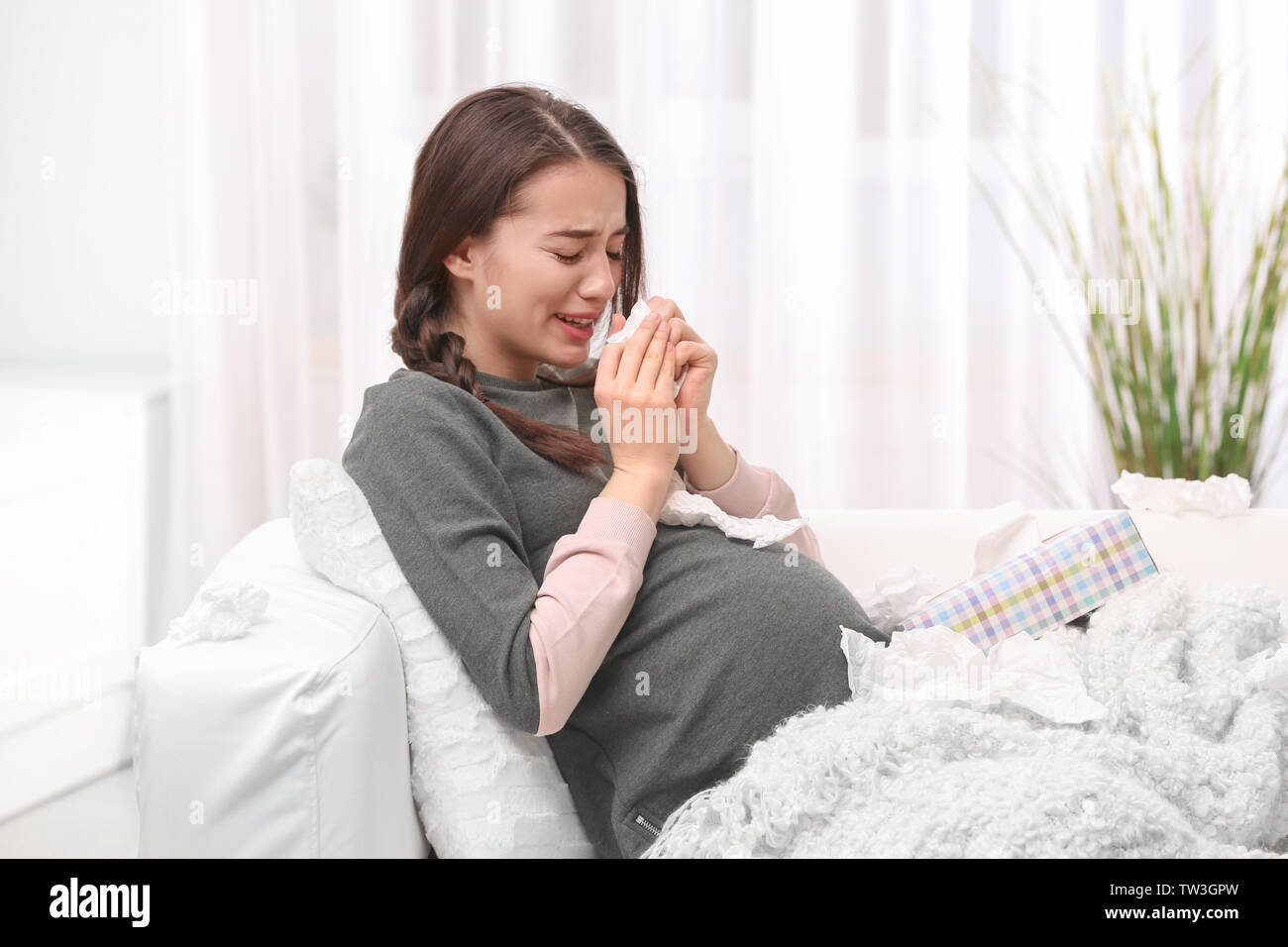 Crying pregnant woman hi-res stock photography and images - Alamy
