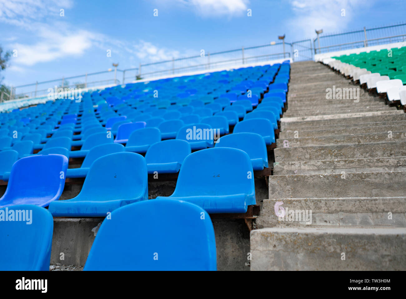 panorama of stadium empty row seats on the open air place before ...