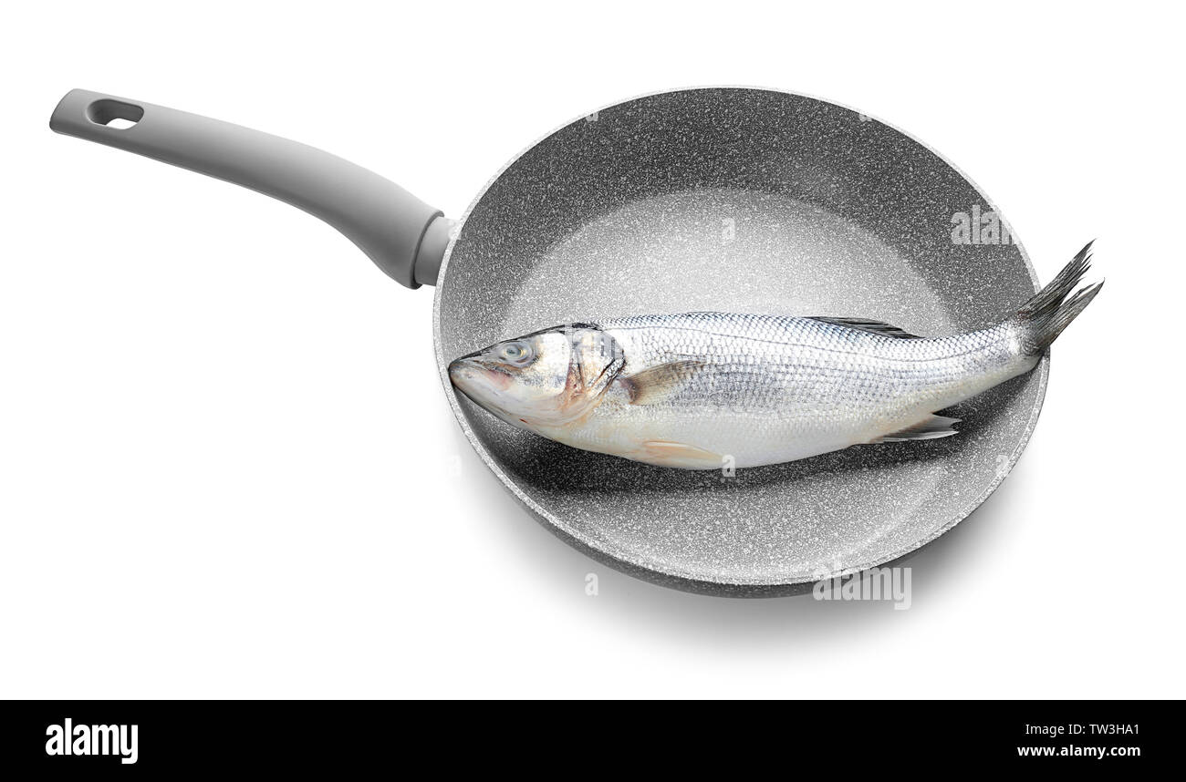Frying pan with raw fish on white background Stock Photo - Alamy