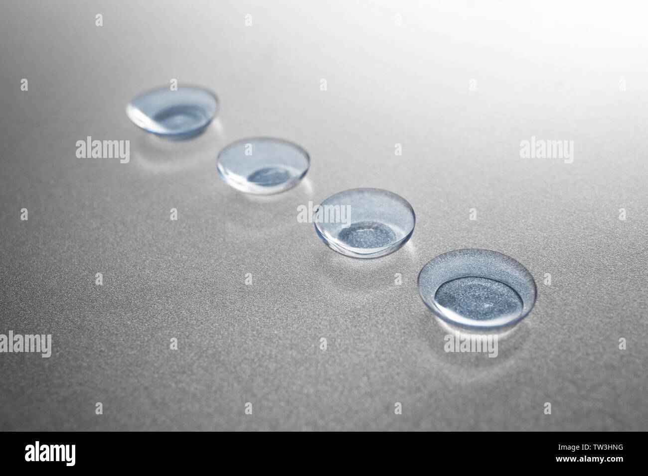 Gray contact lenses hi-res stock photography and images - Alamy