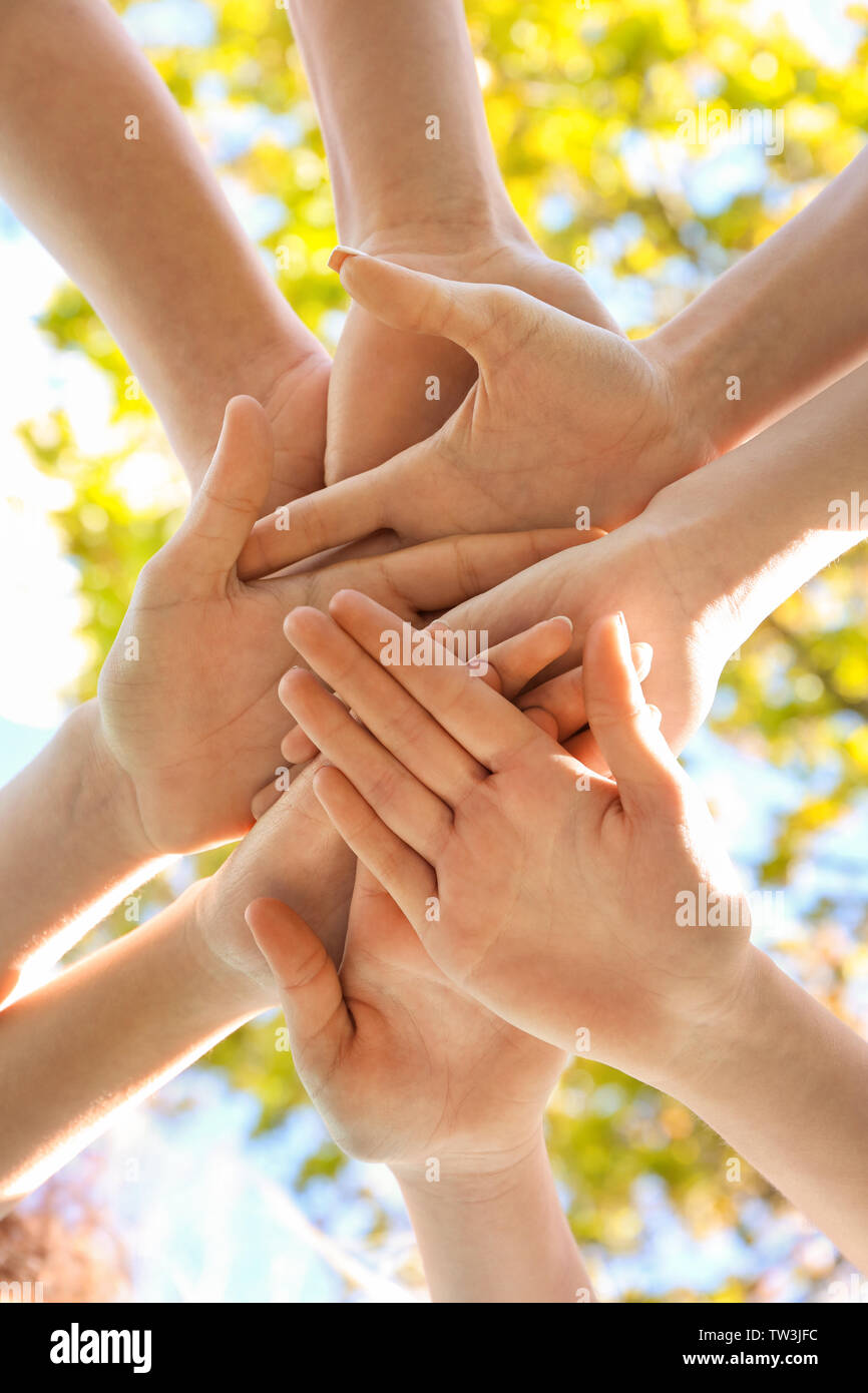 Putting palms together hi-res stock photography and images - Alamy