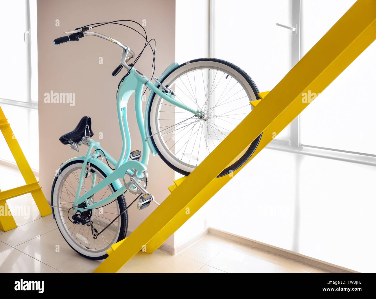 Modern two-wheeled bicycle indoors Stock Photo - Alamy