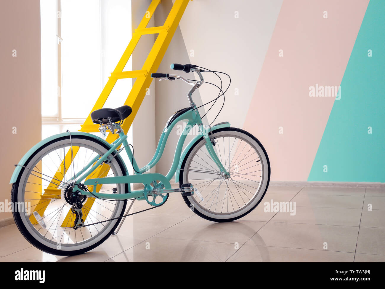 Modern two-wheeled bicycle indoors Stock Photo - Alamy