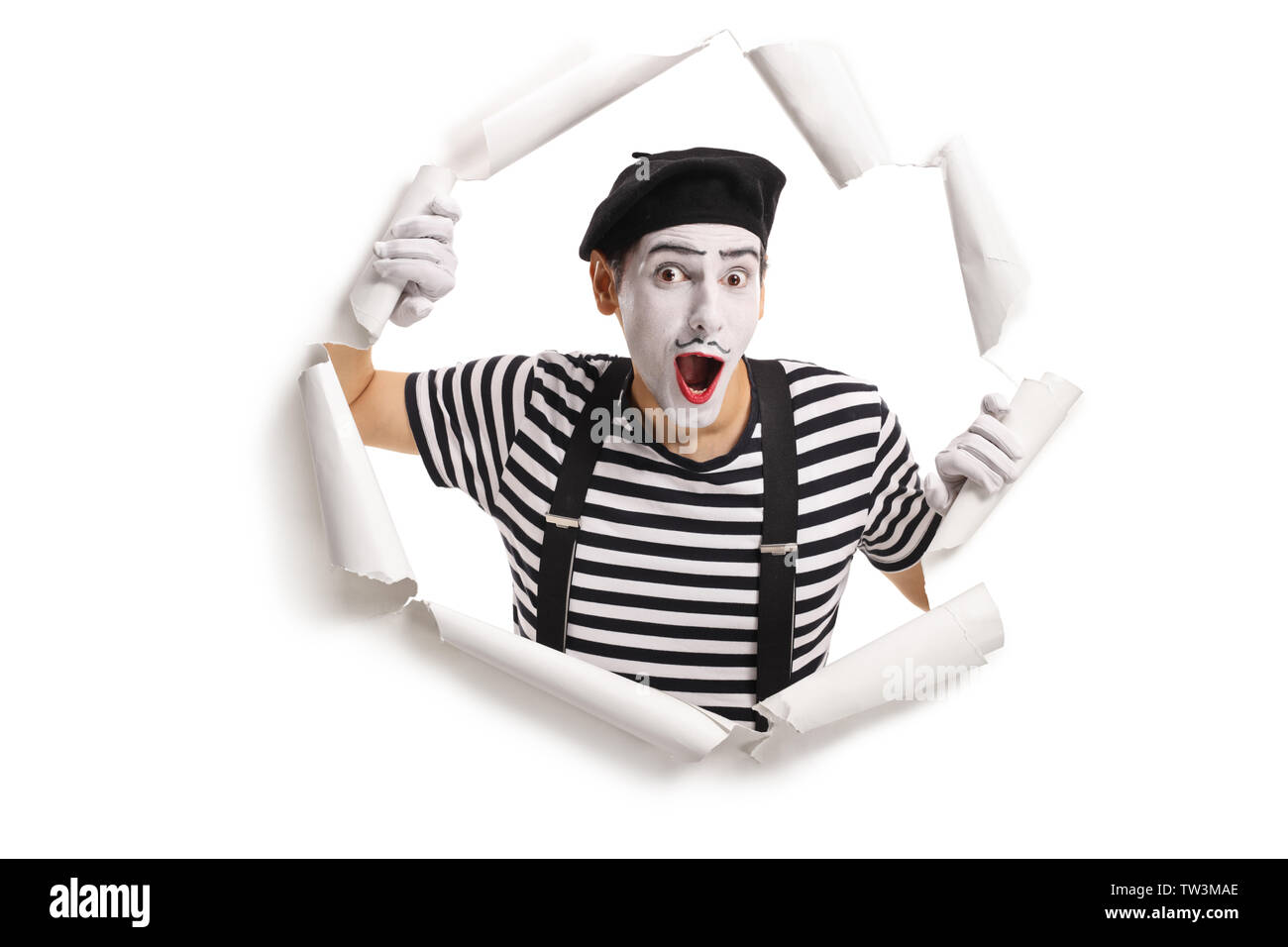 Mime peeking through a paper hole isolated on white background Stock ...