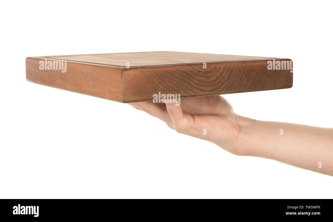 Female hand holding wooden board on white background Stock Photo - Alamy
