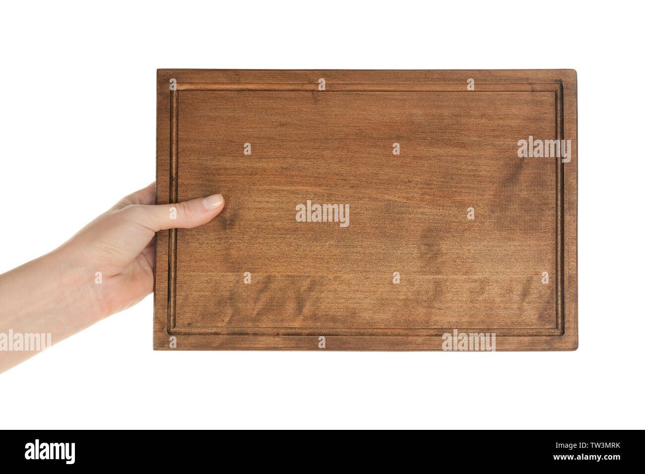 Female hand holding wooden board on white background Stock Photo - Alamy