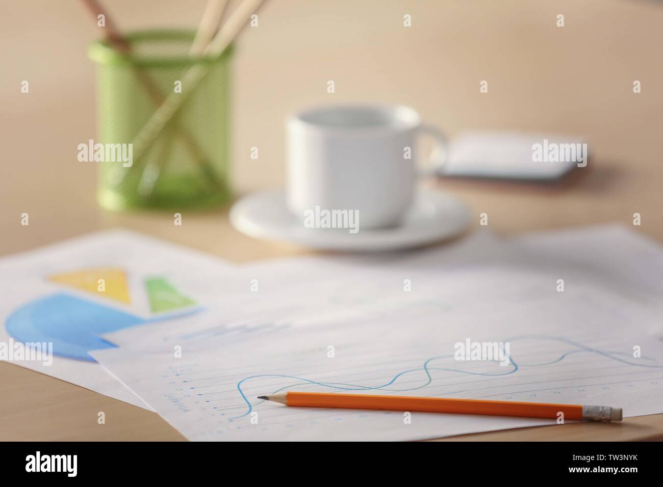 Documents and pencil on office table Stock Photo - Alamy