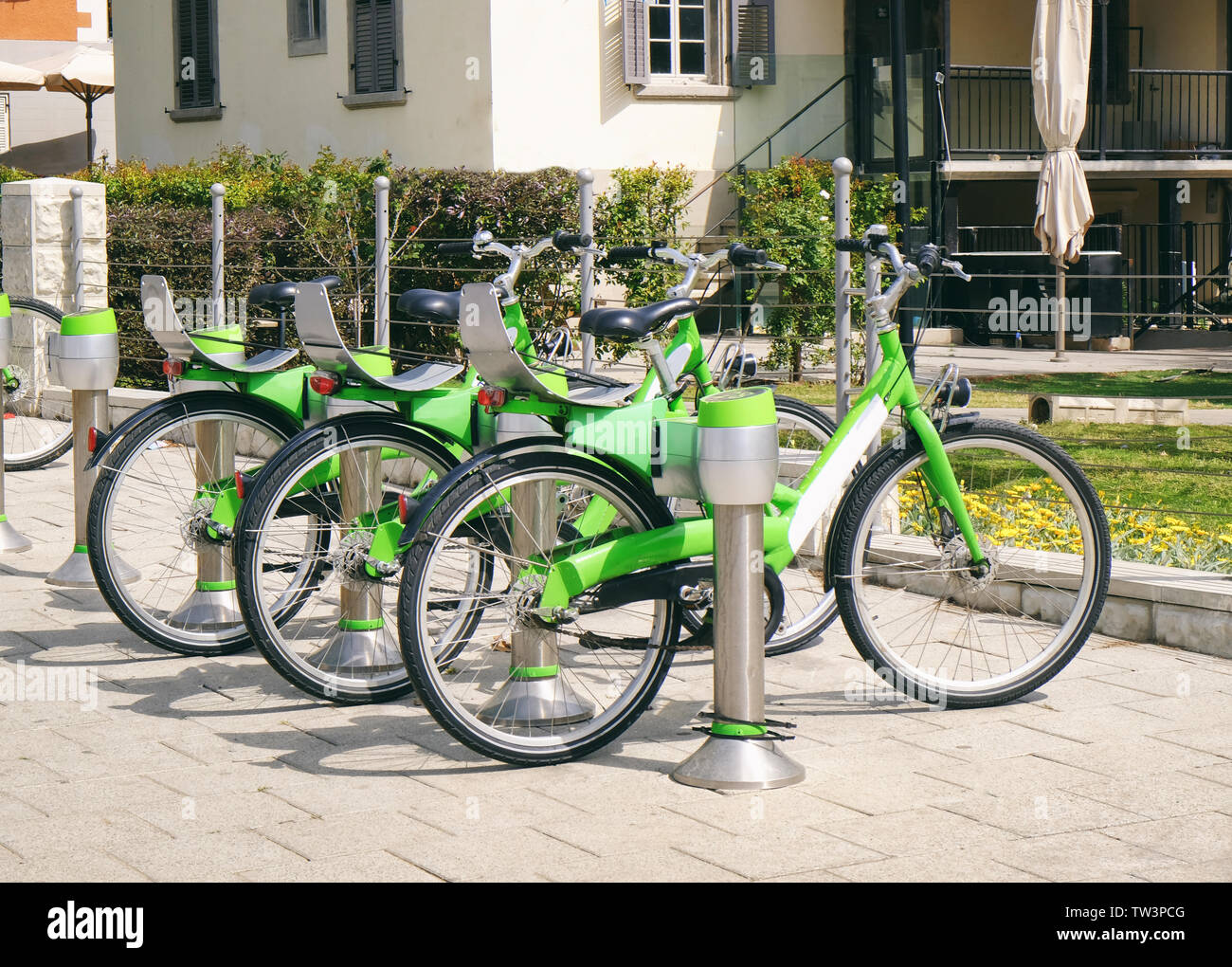 Bicycles in parking lot outdoors Stock Photo - Alamy