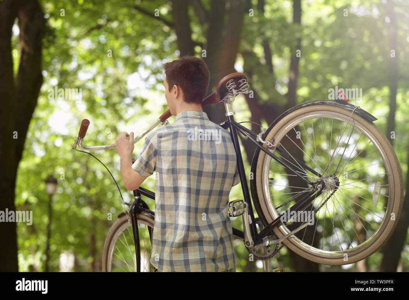 Bike on shoulder hi-res stock photography and images - Alamy