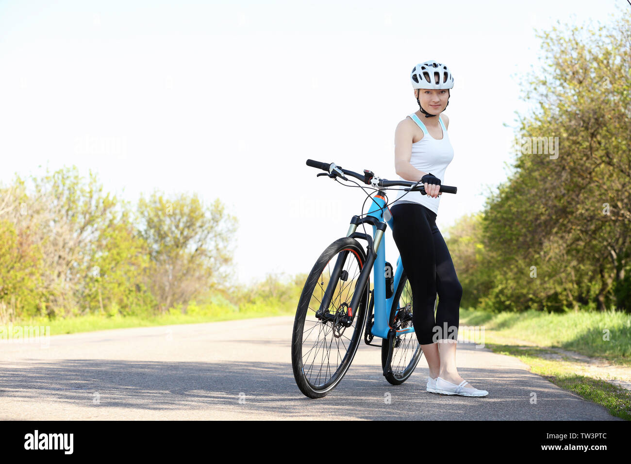 Professional female cyclist outdoors hi-res stock photography and ...