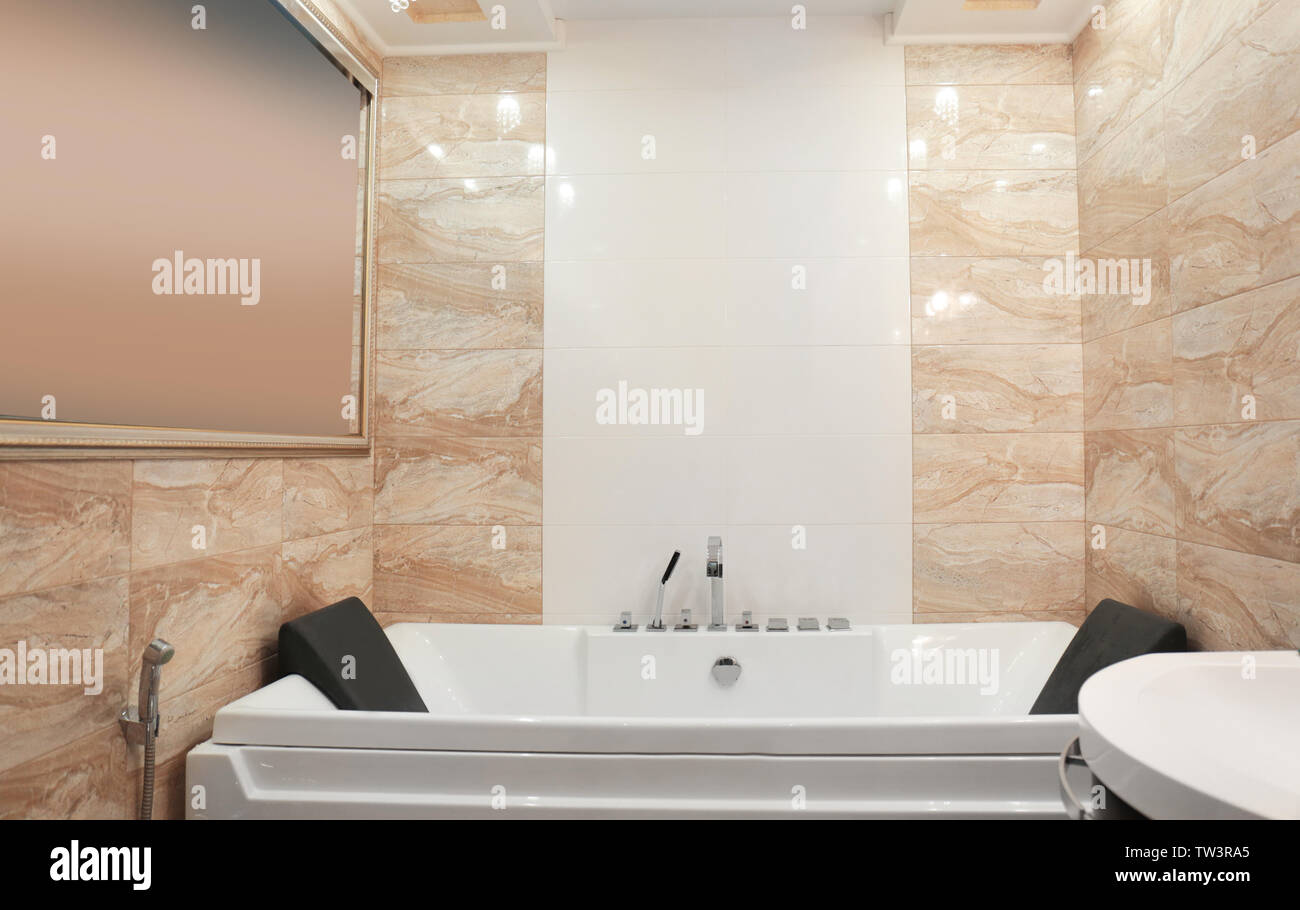 Hydro massage bath in modern spa center Stock Photo - Alamy