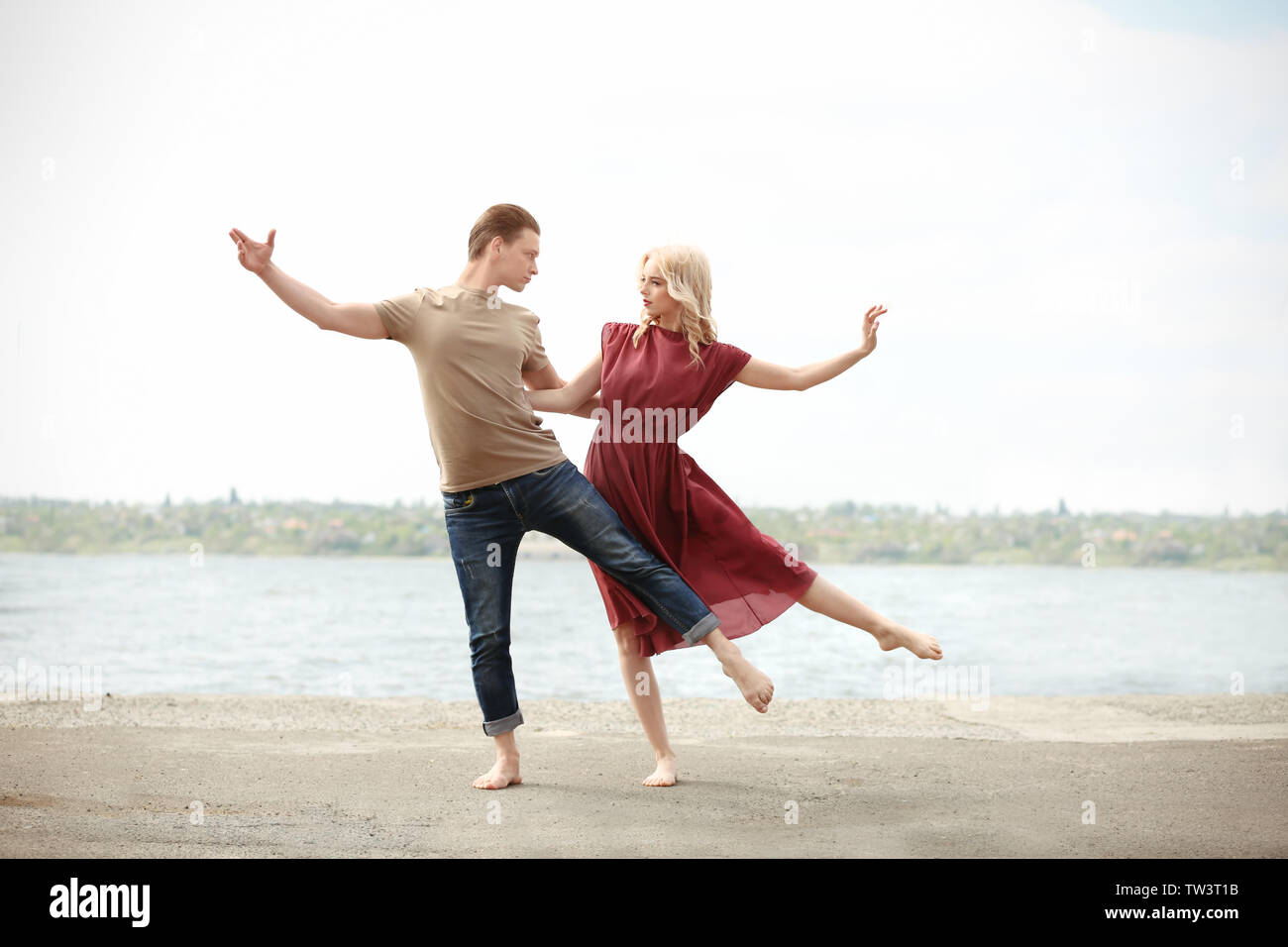 Passionate couple dancing outdoors Stock Photo - Alamy