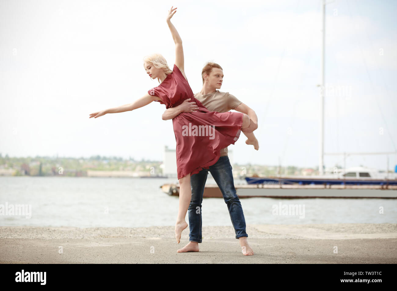 Passionate couple dancing outdoors Stock Photo - Alamy