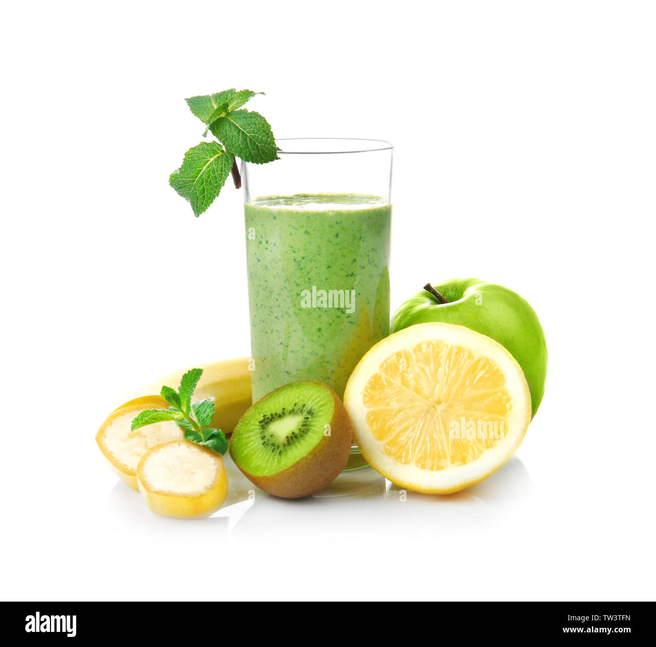 Glass of fresh juice and fruits on white background Stock Photo - Alamy