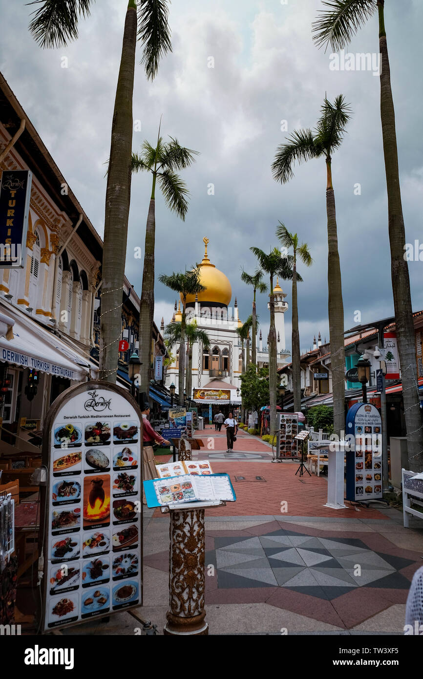 Traditional shophouses line the road towards the Sultan Mosque in ...