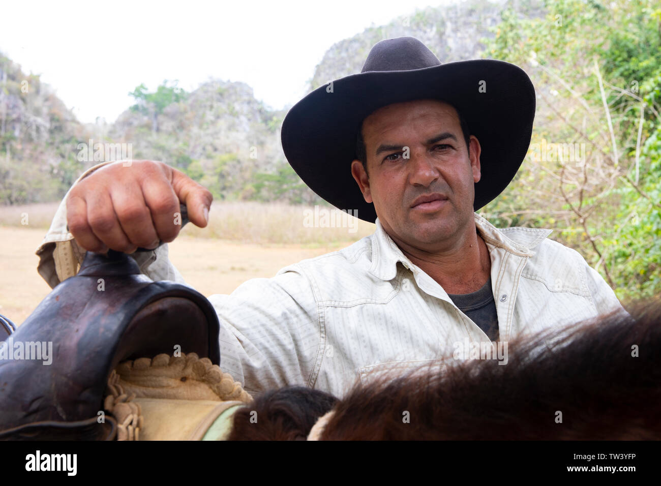 A Cuban Cowboy resting on the side of his Horse at The Mural of ...