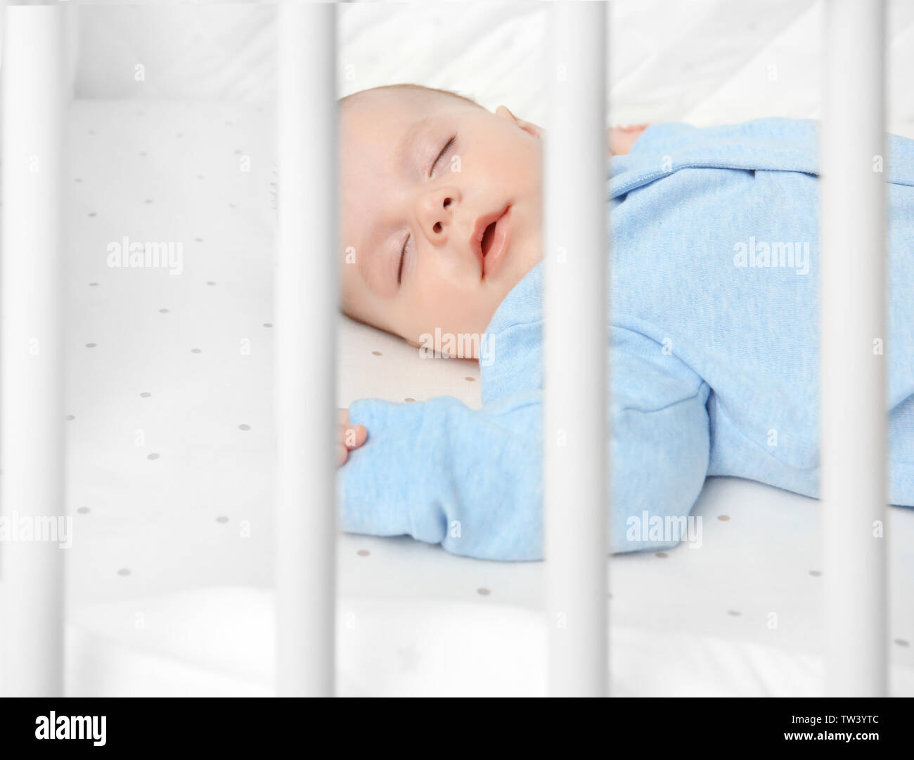 Cute little baby sleeping in cradle at home Stock Photo - Alamy
