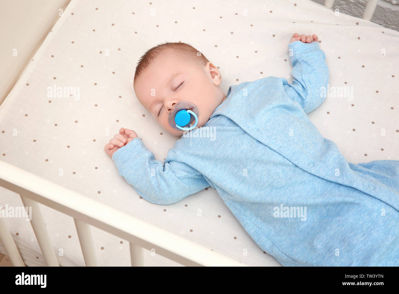 Cute little baby sleeping in cradle at home Stock Photo - Alamy