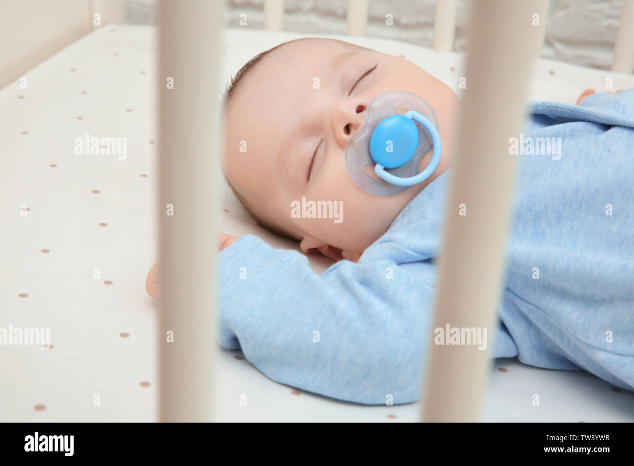 Cute little baby sleeping in cradle at home Stock Photo - Alamy