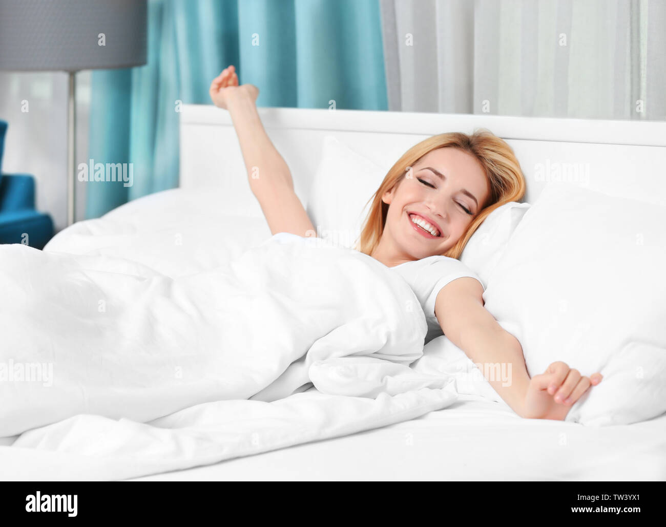 Morning of beautiful young woman in hotel room Stock Photo - Alamy