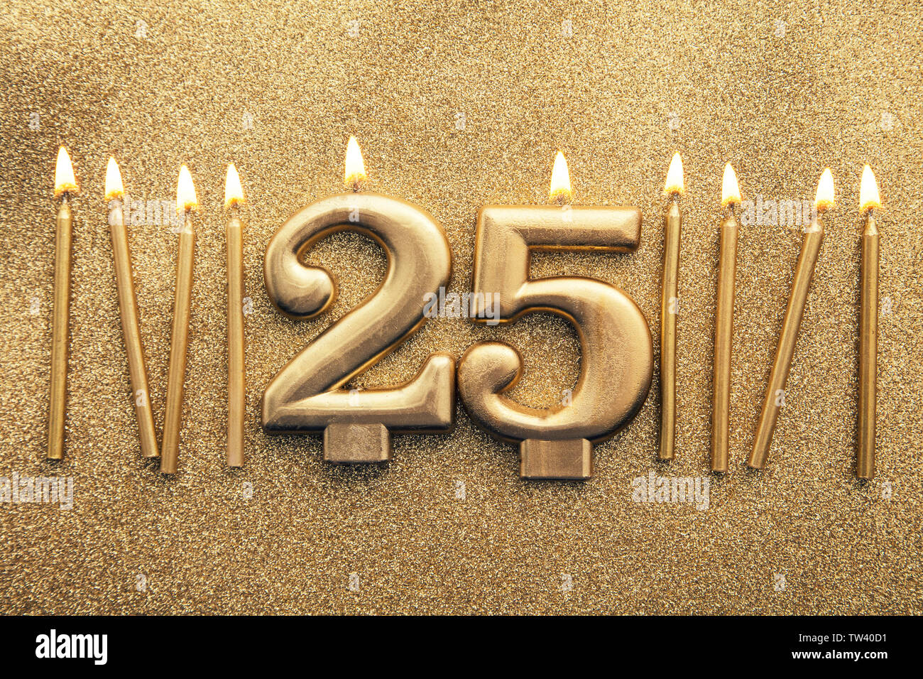 Number 25 gold celebration candle on a glitter background Stock Photo ...