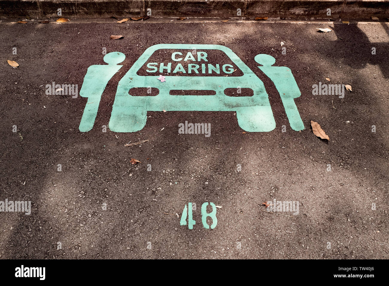 Road car sign showing where to park and charge a self service sharing ...