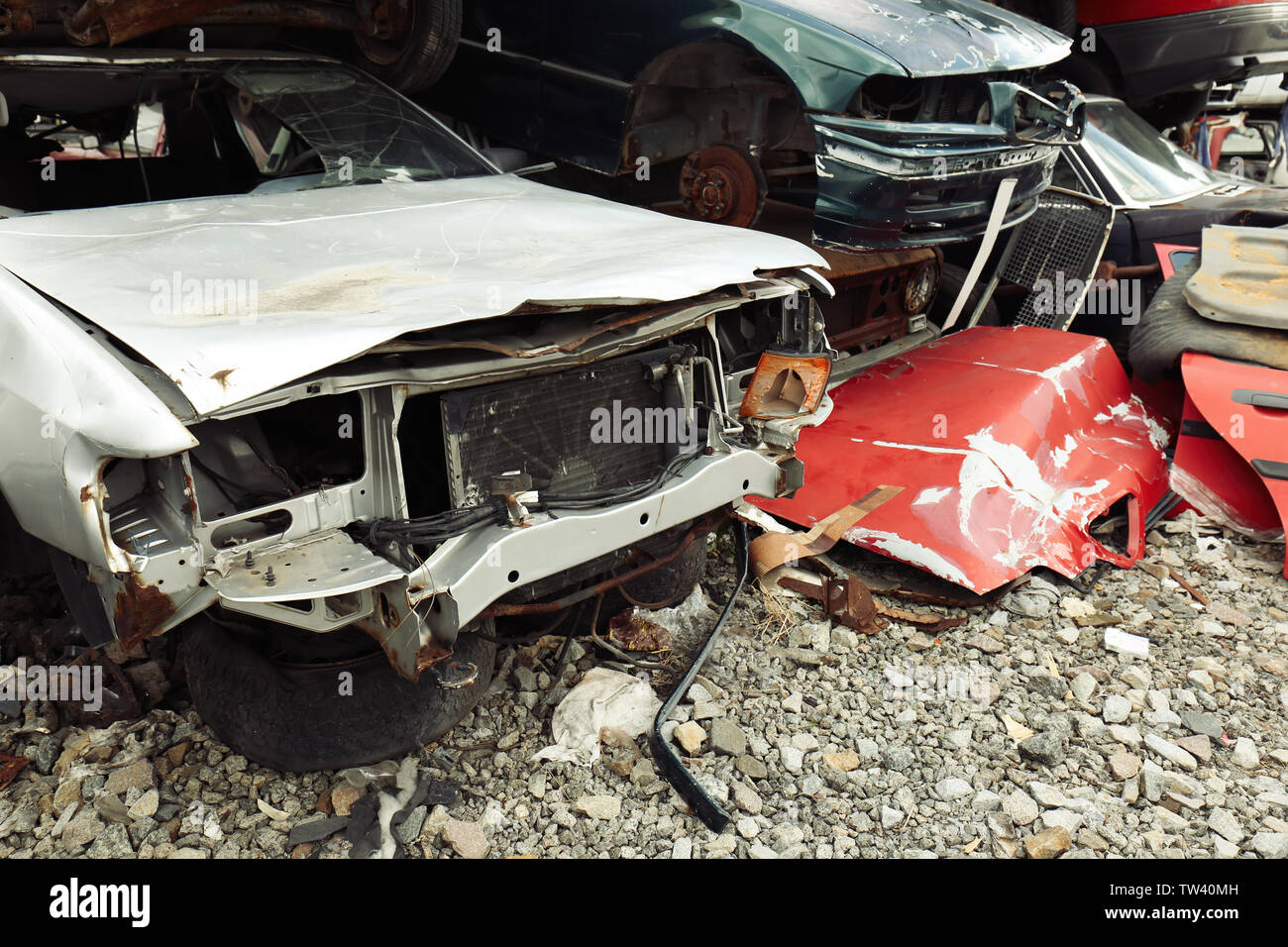 Piled crushed cars on salvage yard Stock Photo - Alamy