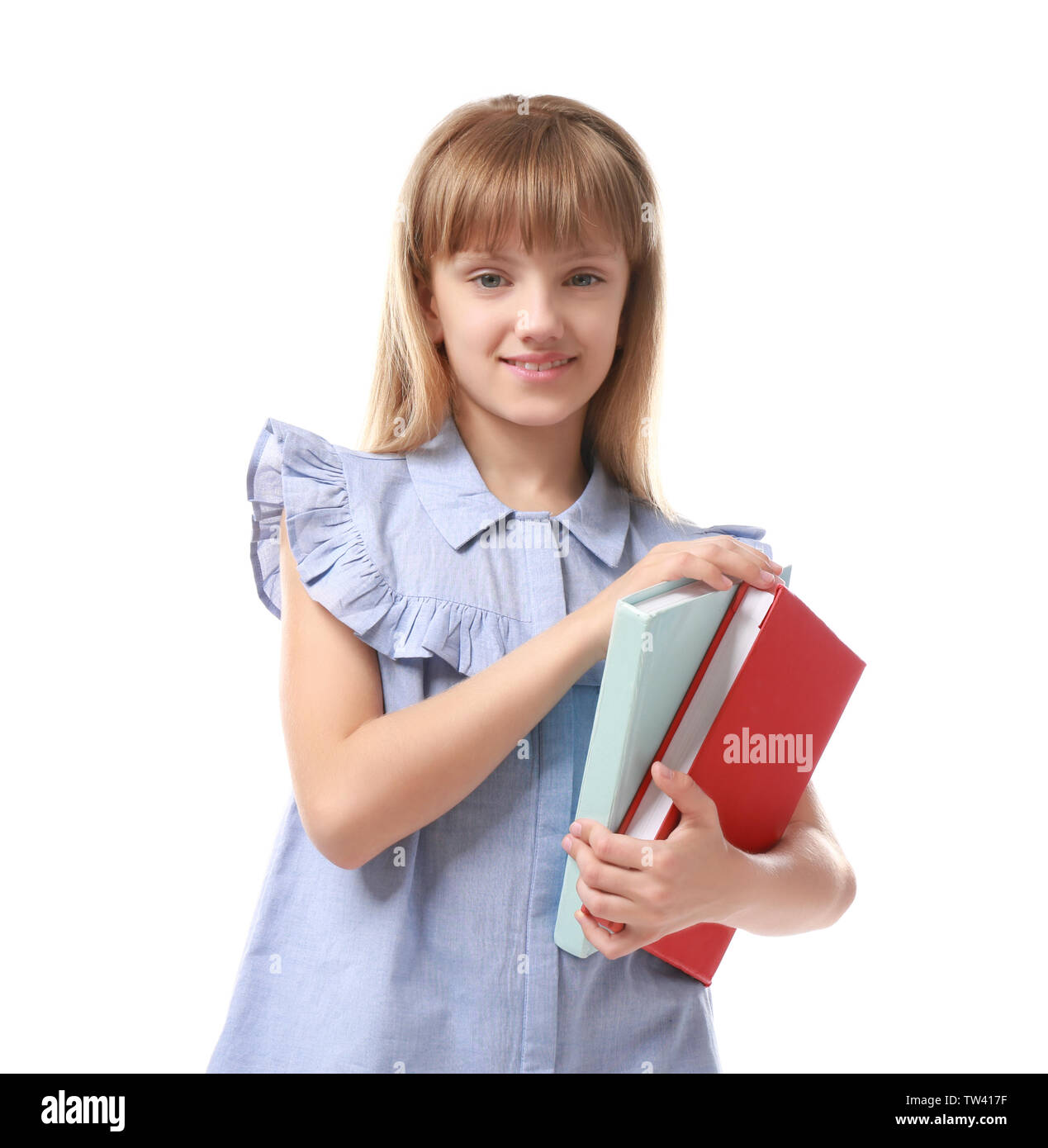 Pretty little girl with books on white background Stock Photo - Alamy